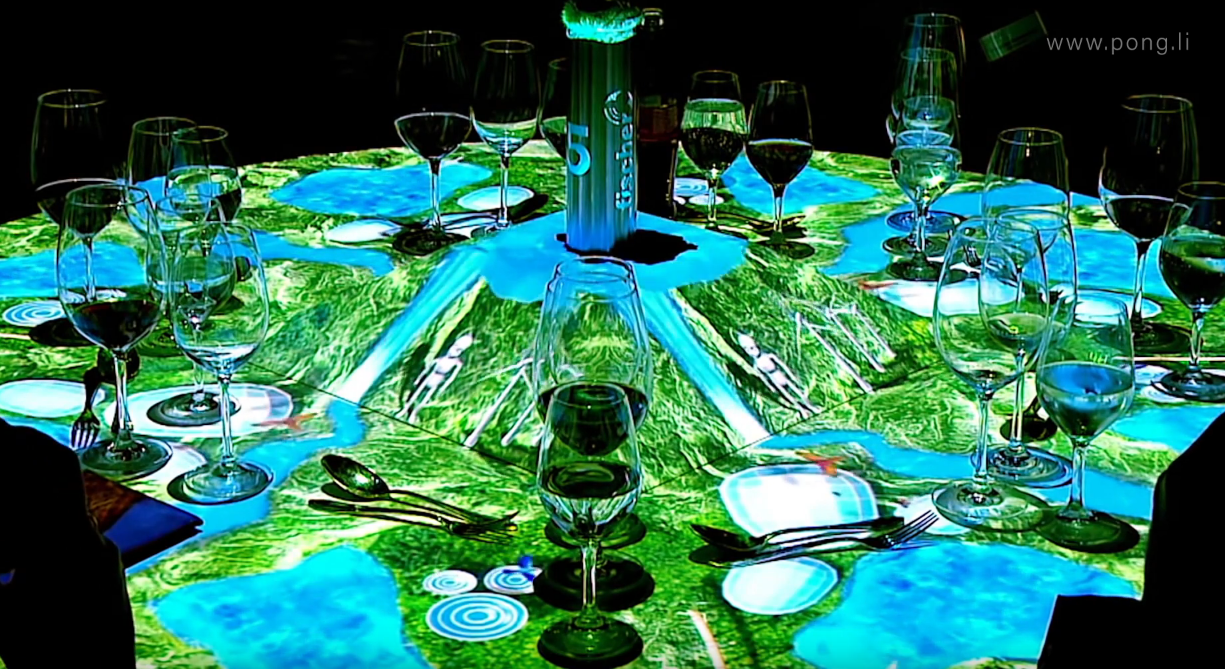 Table Projection "50 Years of Fischer Group" - showcased